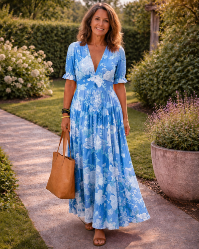 Ione | Kurzes ärmelloses V-Ausschnitt Blumen-Midi-Kleid – Bergmann-mode